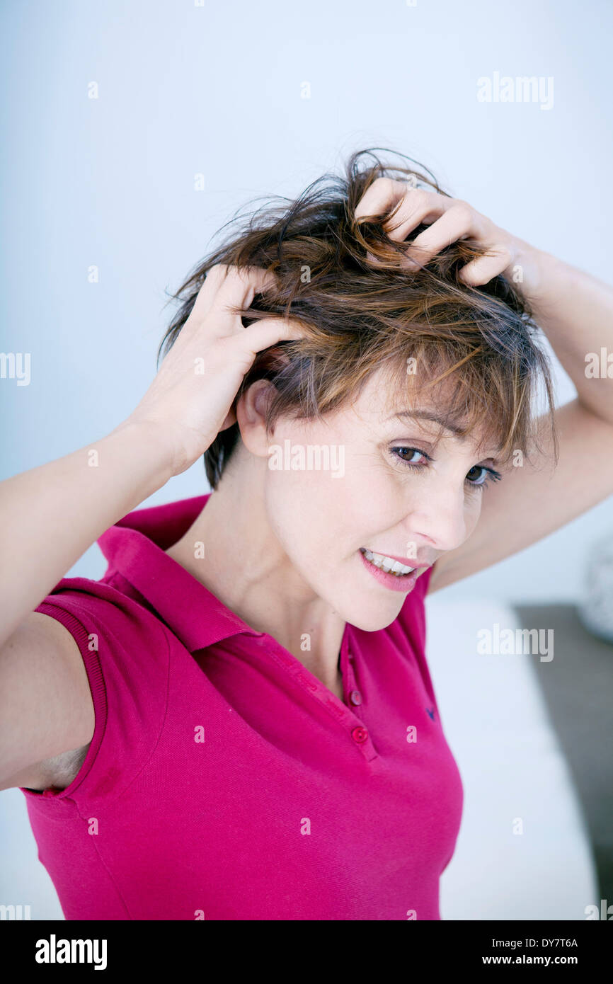 Woman itching head hi-res stock photography and images - Alamy