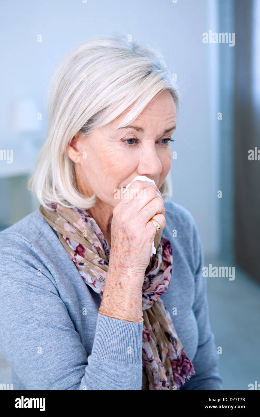 Elderly person with rhinitis Stock Photo - Alamy