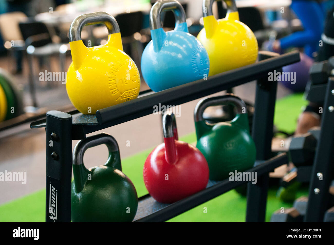 Coloured weights on the fitness fair FIBO in Cologne, Germany Stock ...