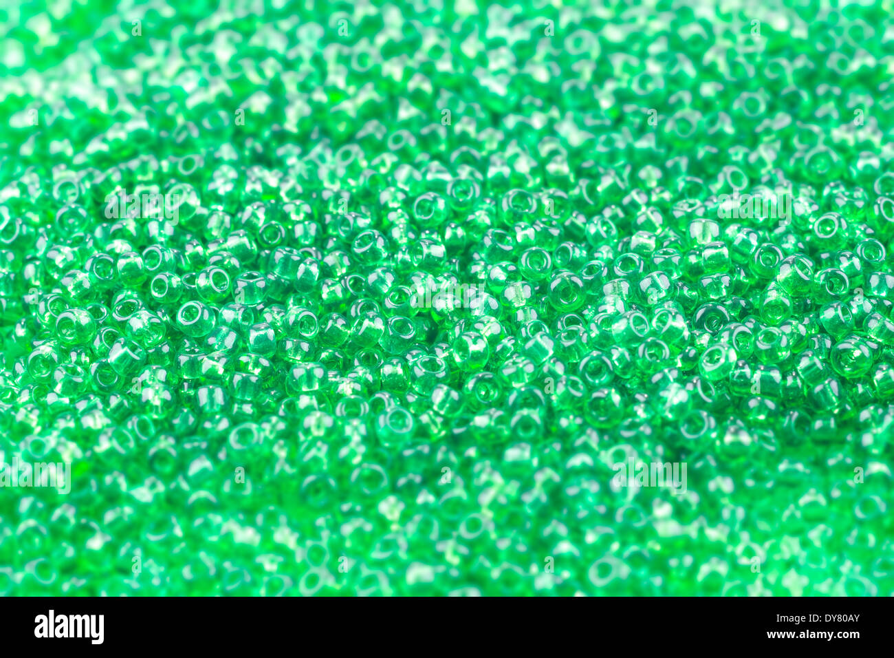 Green beads background Stock Photo - Alamy