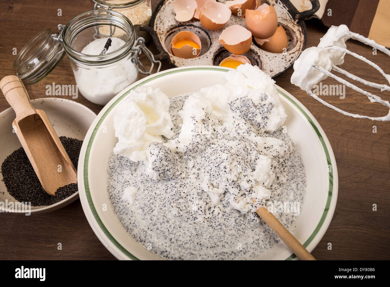 Mixing ingredients for poppy seed cake Stock Photo - Alamy