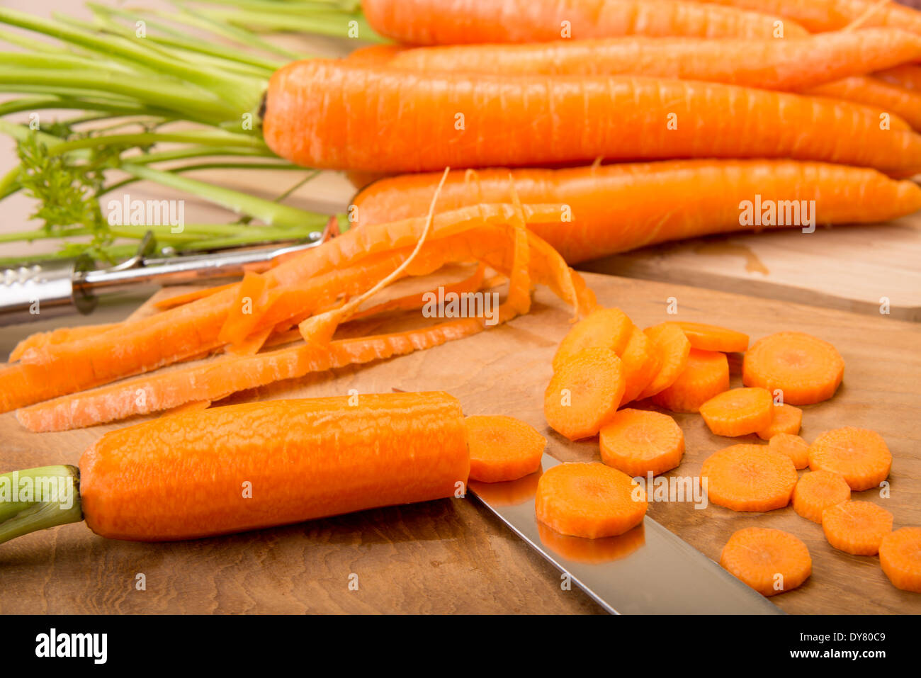 Chopped carrots on chopping board Stock Photo - Alamy