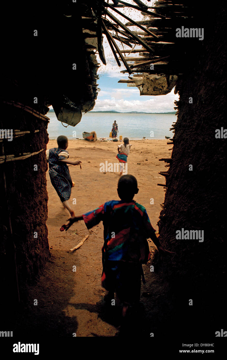 Children play in a village on one of the many islands within Lake ...