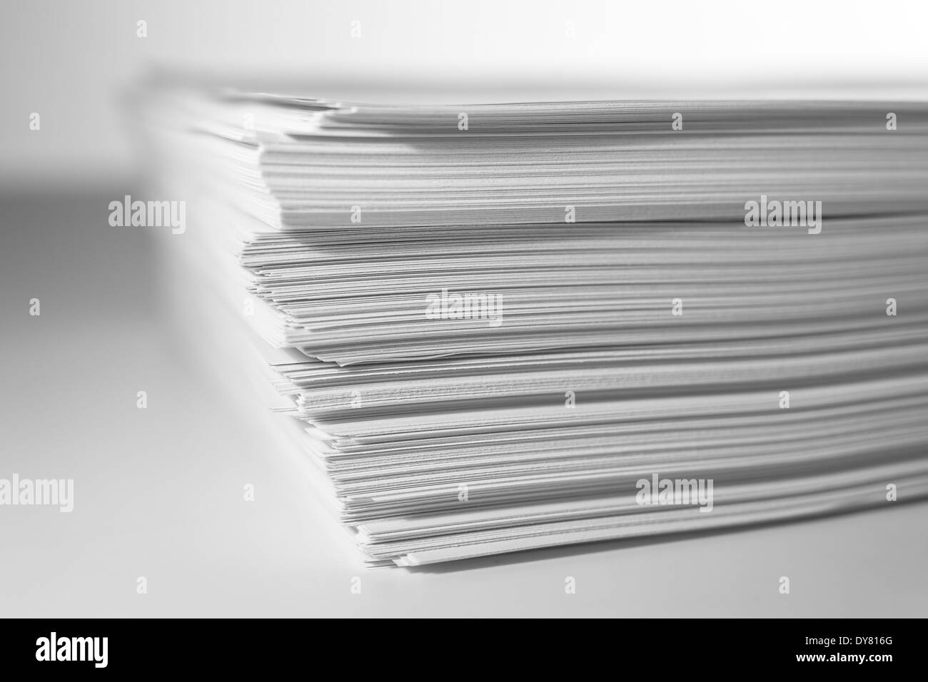 Stack of blank papers, partial view Stock Photo - Alamy
