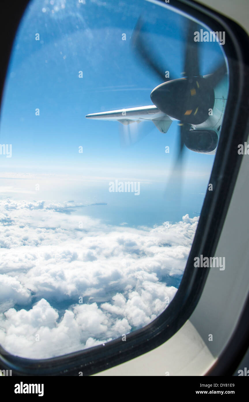 View through a window of an ATR 42/72 aircraft Stock Photo - Alamy