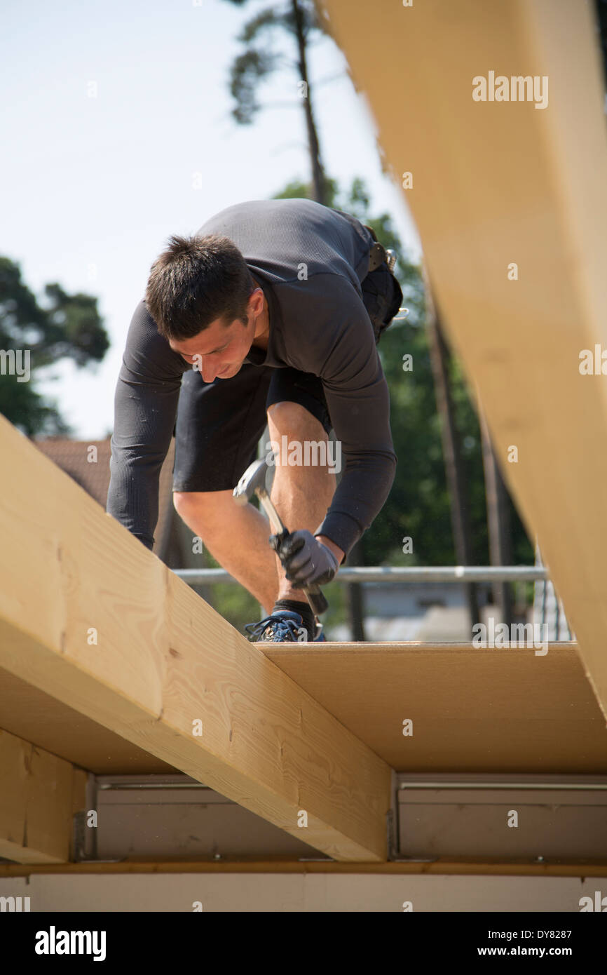 Construction of a residential house, assembling of the roof Stock Photo ...