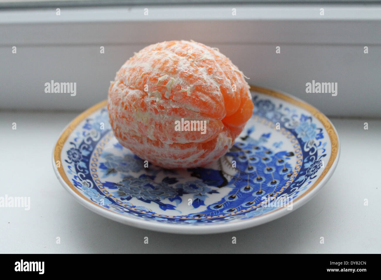 sweet mellow fruit dessert on blue plate Stock Photo - Alamy