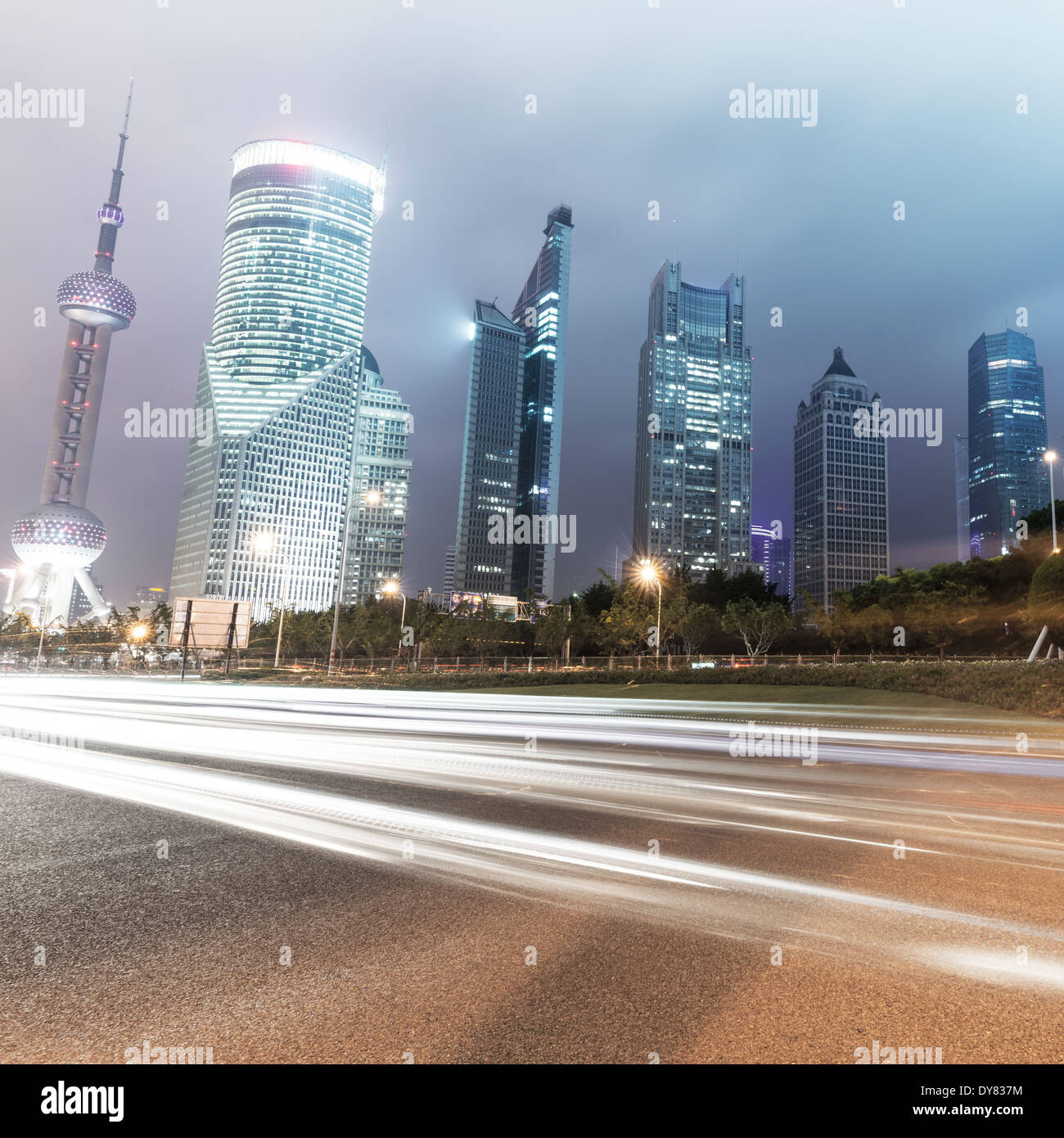 the light trails on the modern building background in shanghai china ...