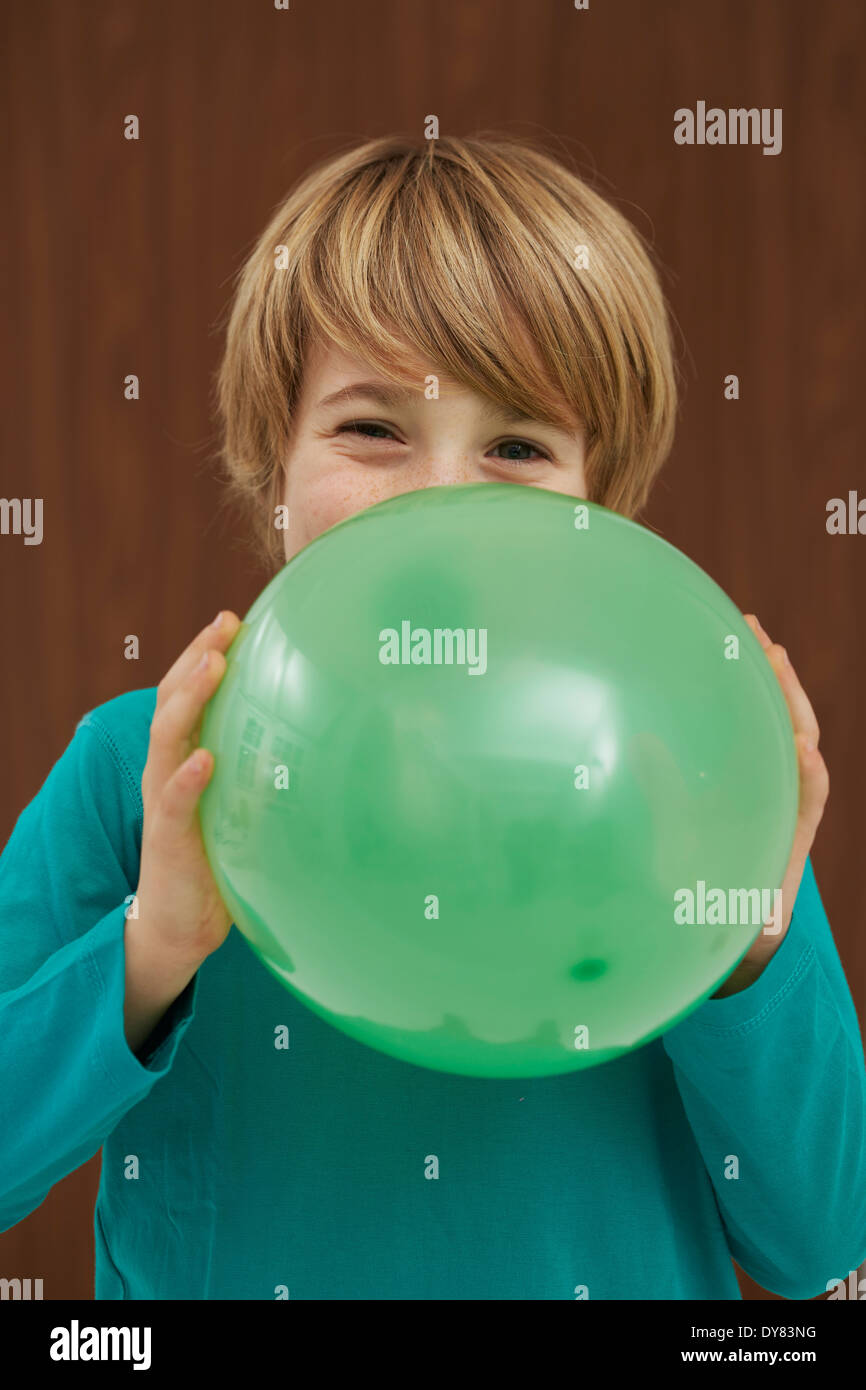 Boy with balloon hi-res stock photography and images - Alamy
