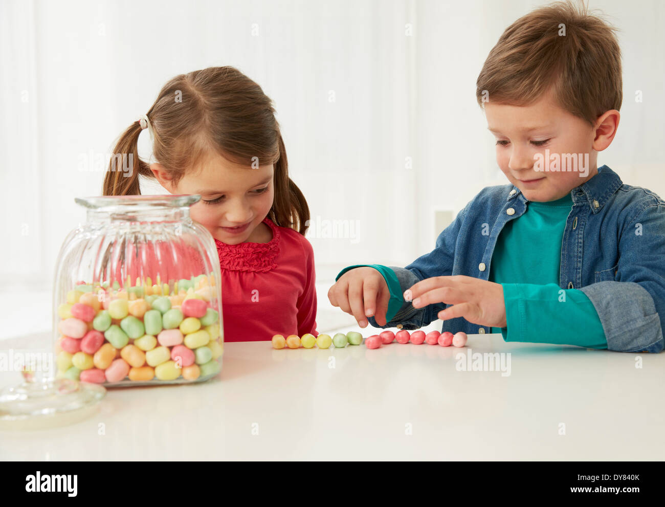 Child counting candy hi-res stock photography and images - Alamy