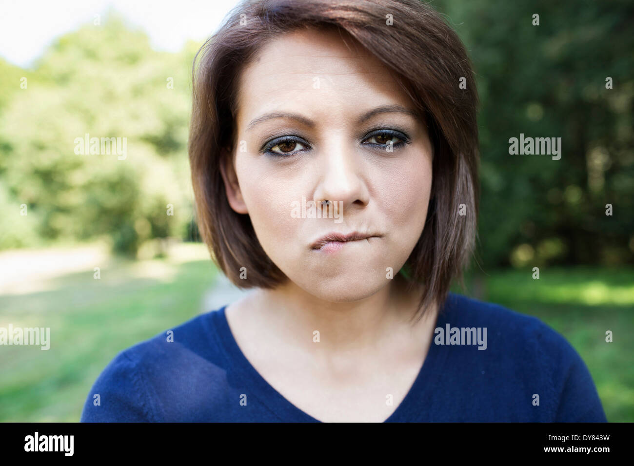 Portrait of angry woman Stock Photo - Alamy