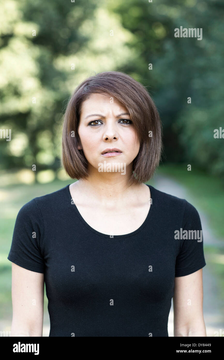 Portrait of irritated woman Stock Photo - Alamy