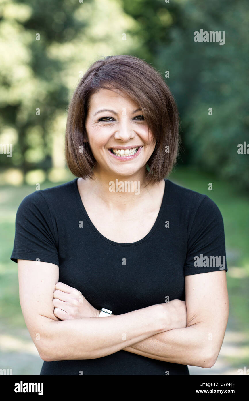 Portrait of grinning woman Stock Photo - Alamy