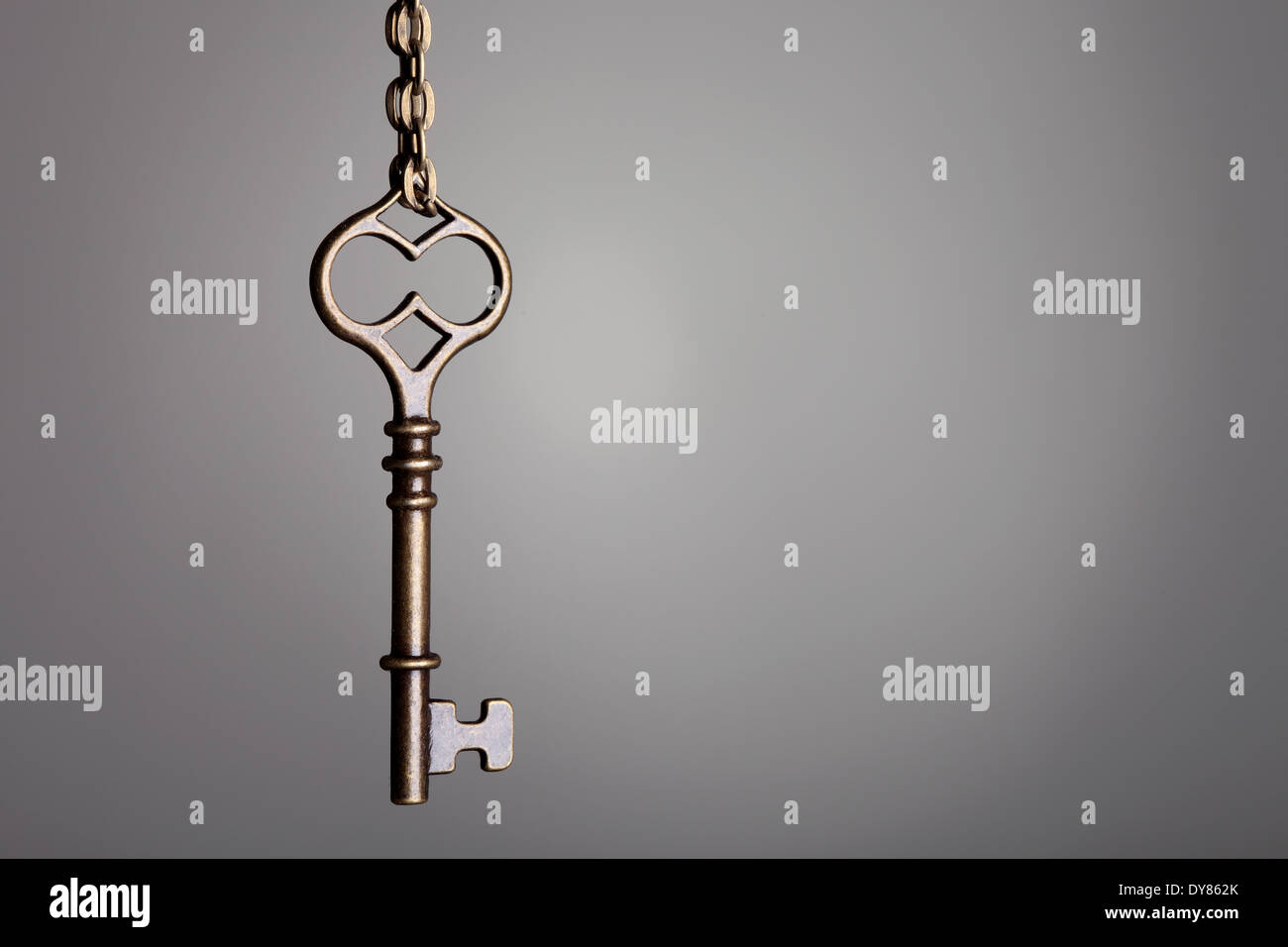 picture of an old keys on a grey background Stock Photo - Alamy