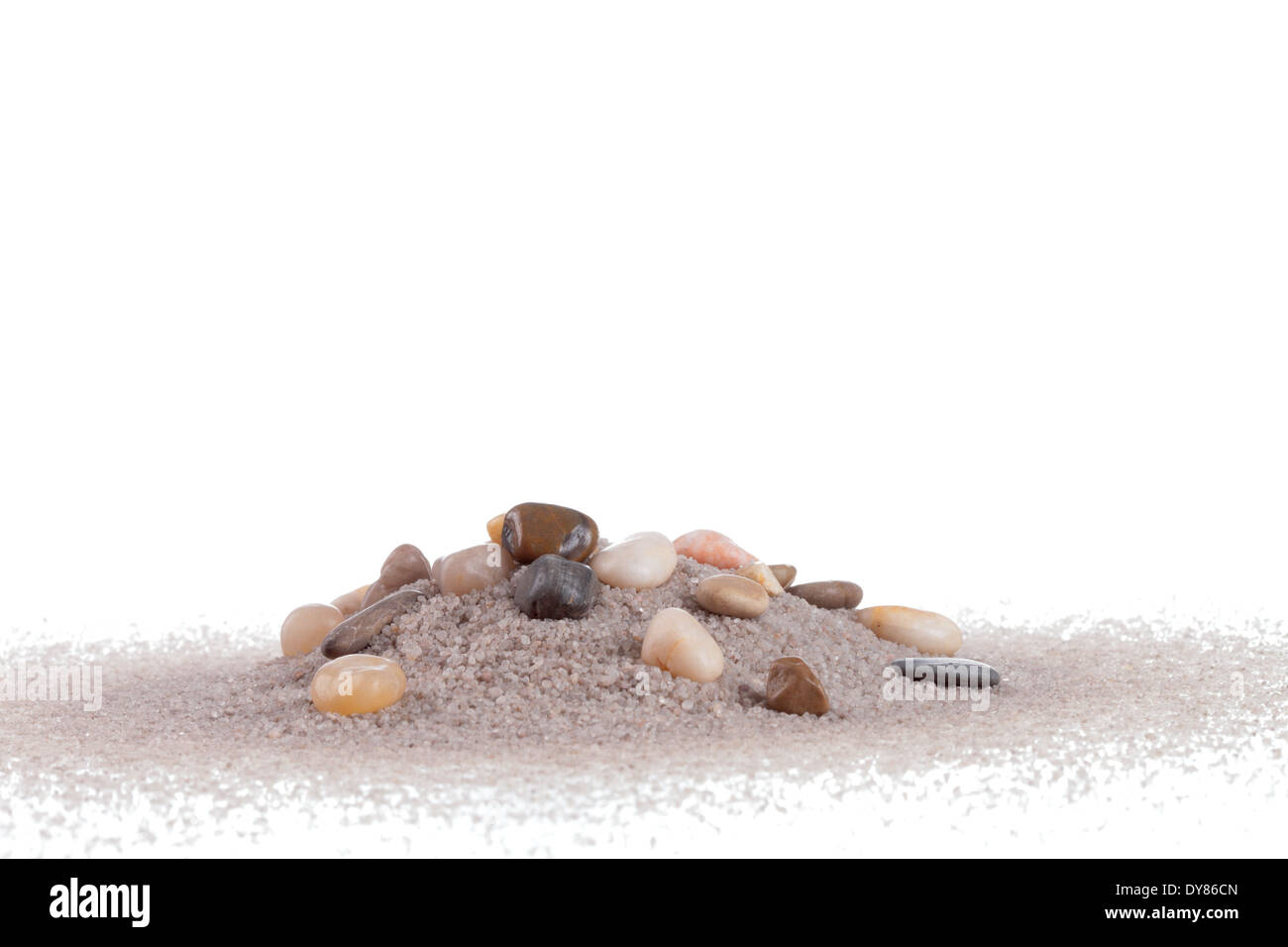 decorative stones buried in sand Stock Photo - Alamy