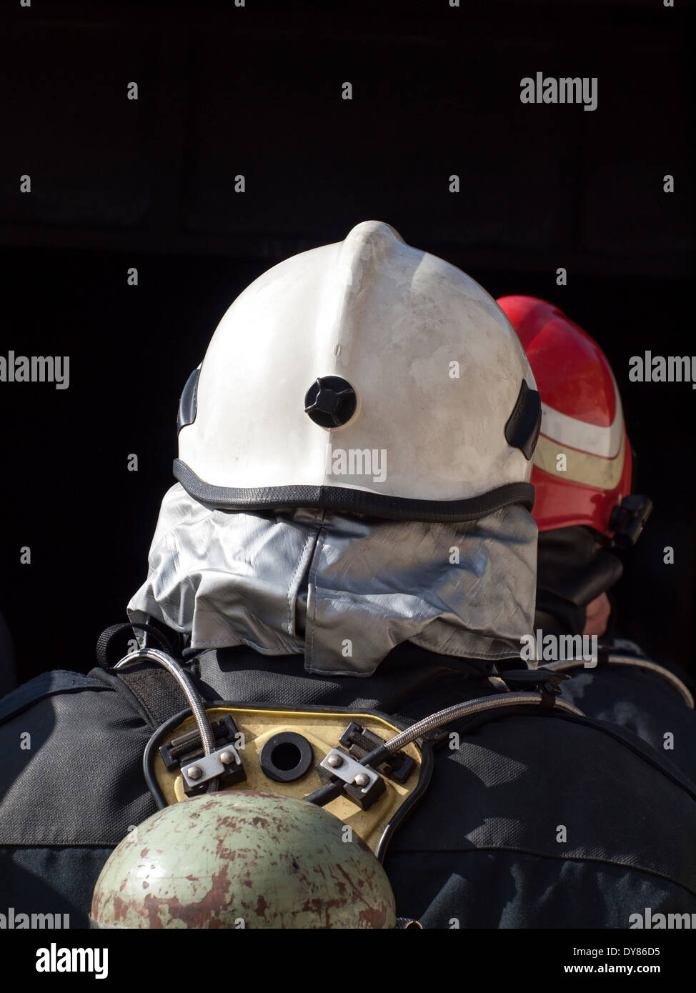 Two firefighters ready for action Stock Photo - Alamy