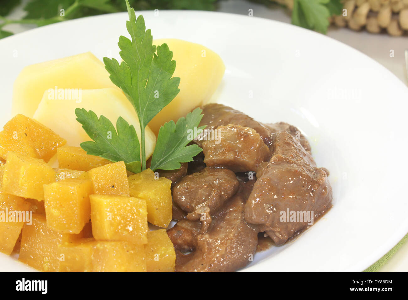 Venison goulash with turnip and cooked potatoes Stock Photo - Alamy