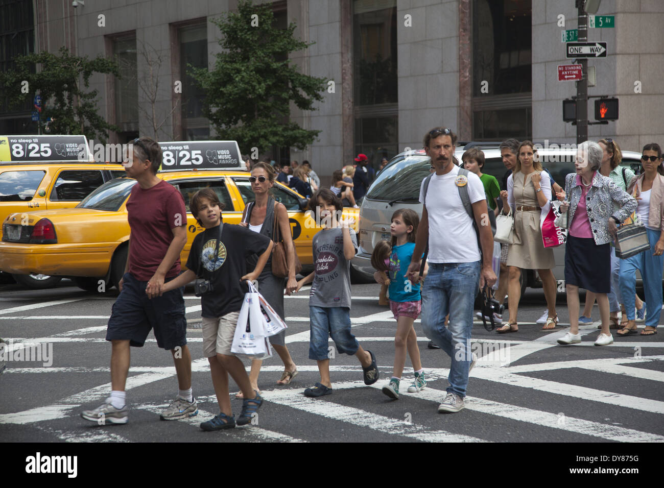 Kids cross street at crosswalk hi-res stock photography and images - Alamy