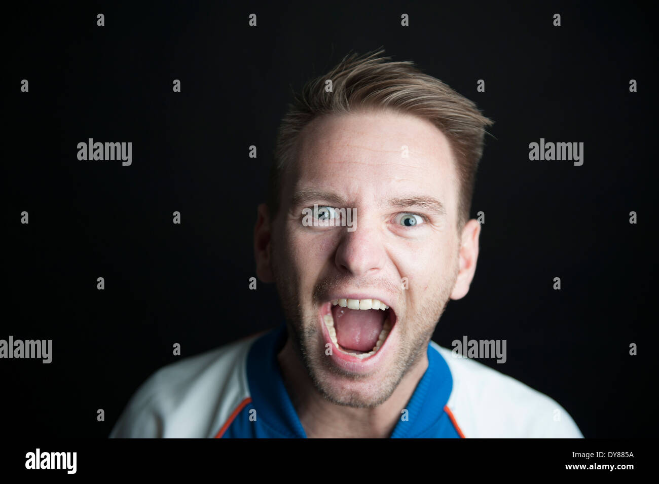 Shouting man, portrait Stock Photo - Alamy