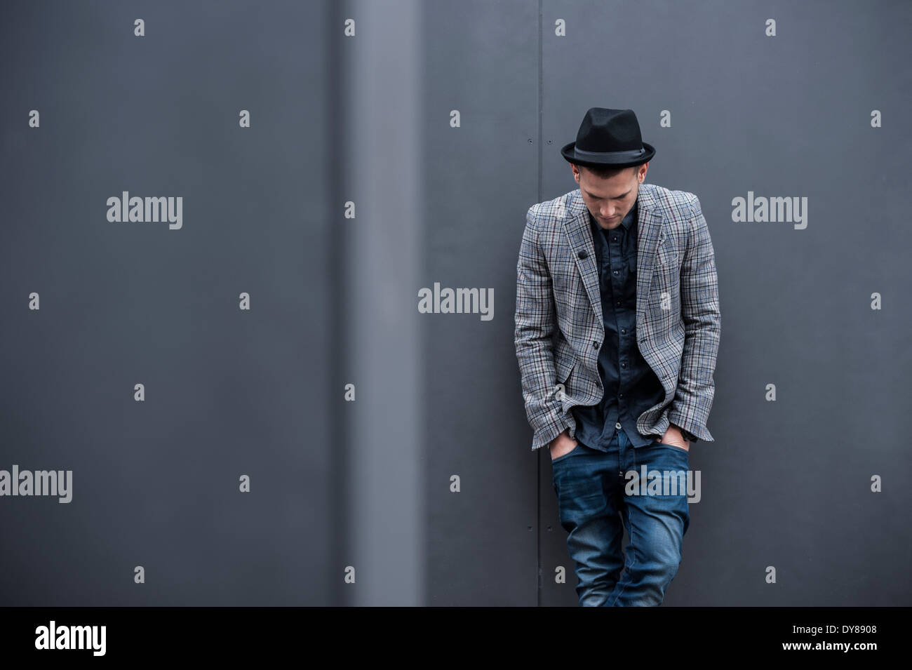 Man looking down with hat hi-res stock photography and images - Alamy