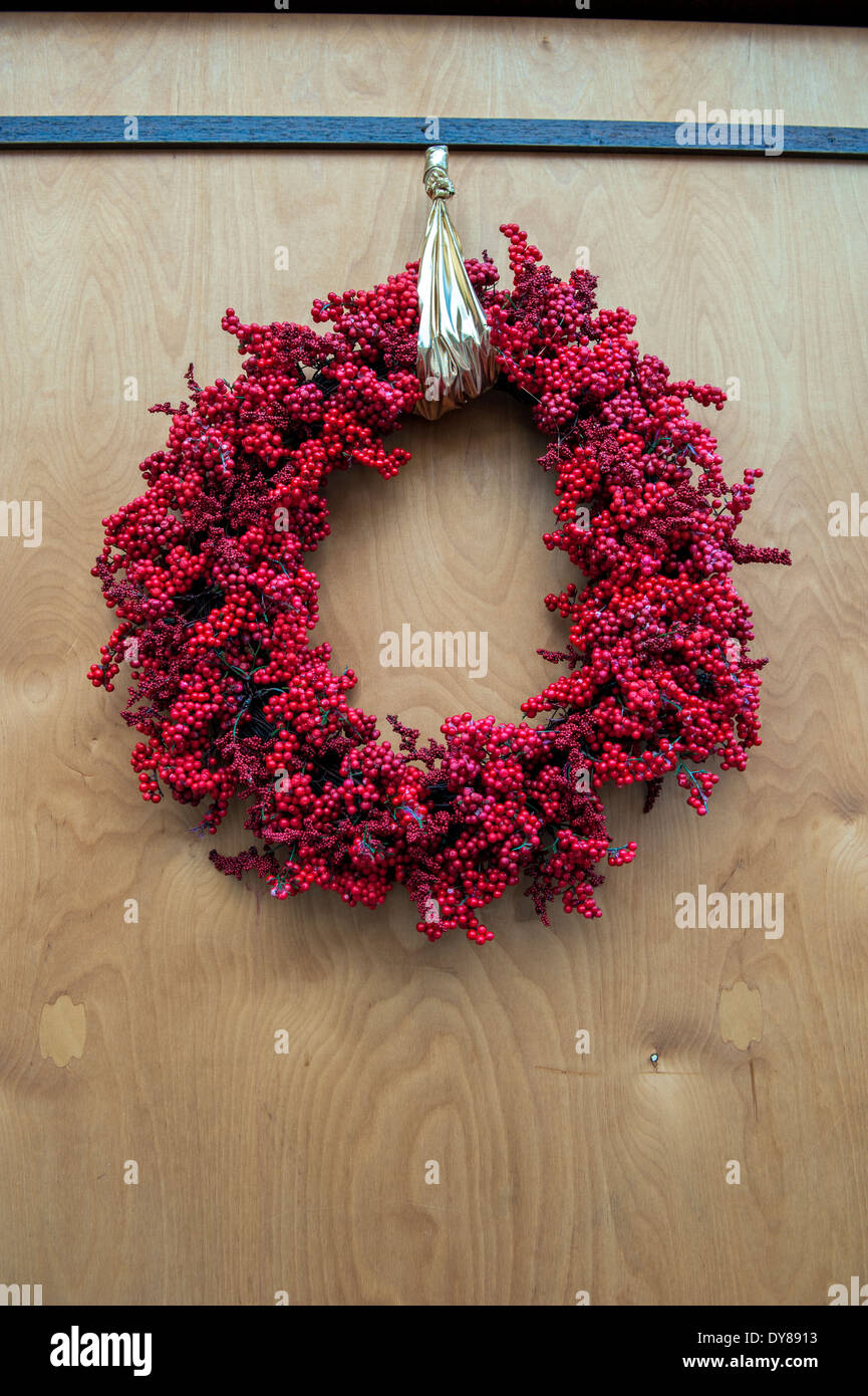 Berry holiday wreath at the Christmas market in Cologne, Germany Stock ...
