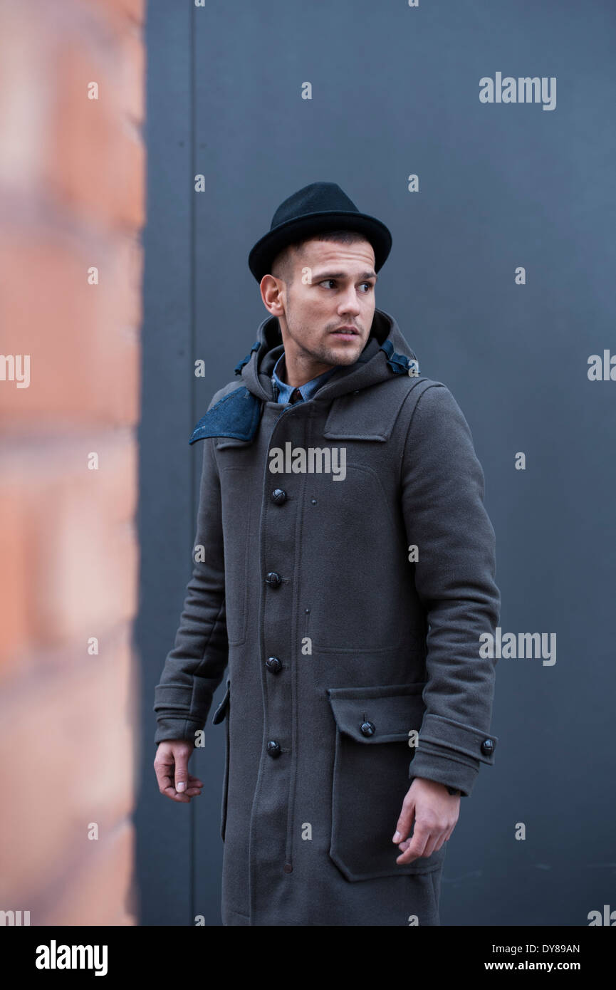 Man overcoat hat hi-res stock photography and images - Alamy