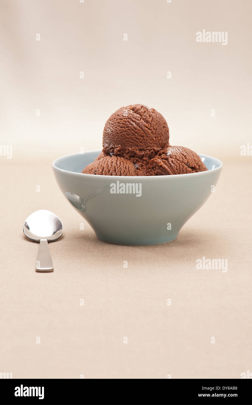 chocolate ice cream over a beige background Stock Photo - Alamy