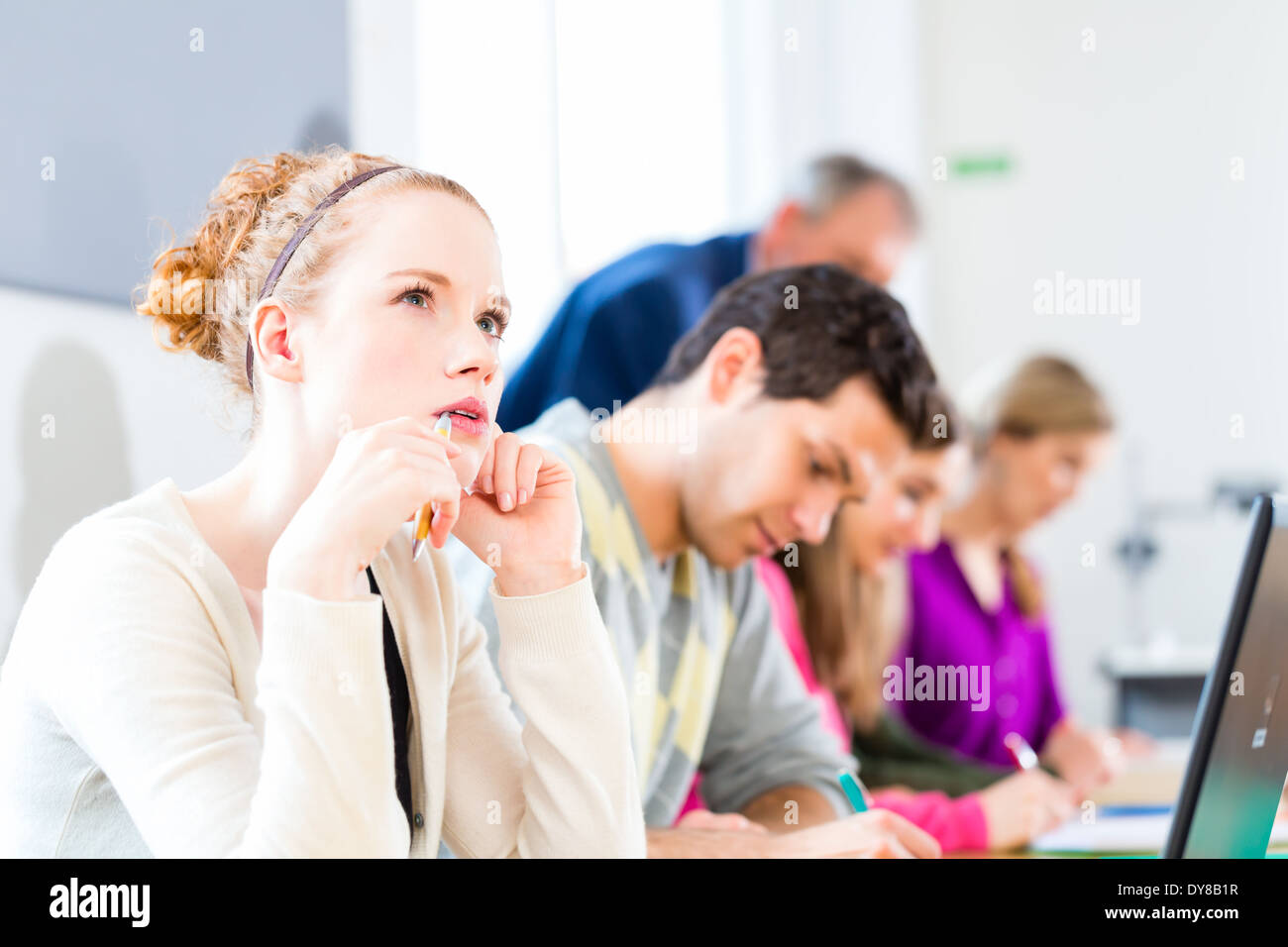 Women writing exam hi-res stock photography and images - Alamy