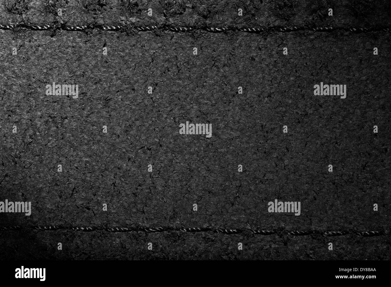 black background with seam or rough pattern leather texture Stock Photo ...