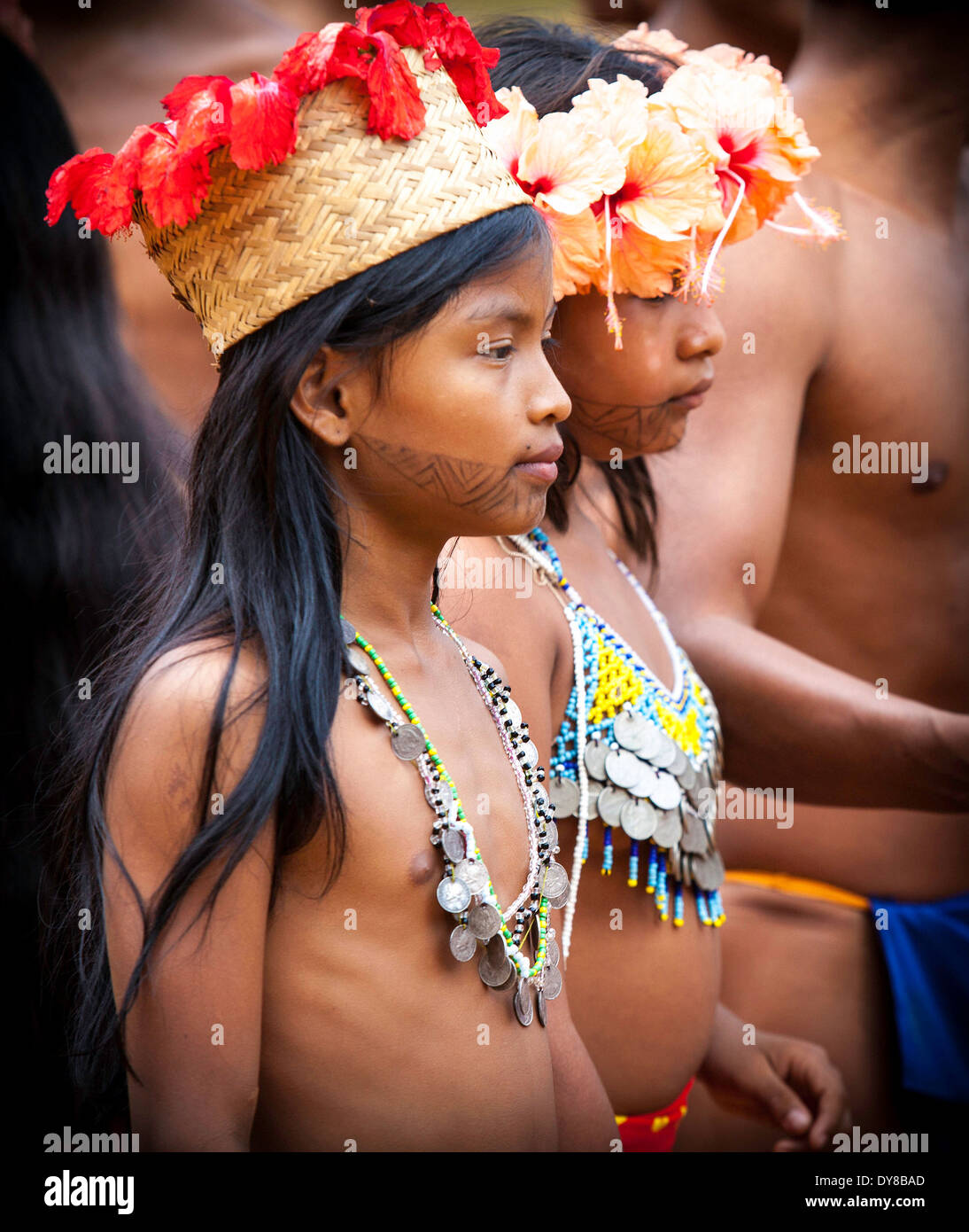 Young indigenous Embera Indian dancers prepare to perform traditional dance in their village ...