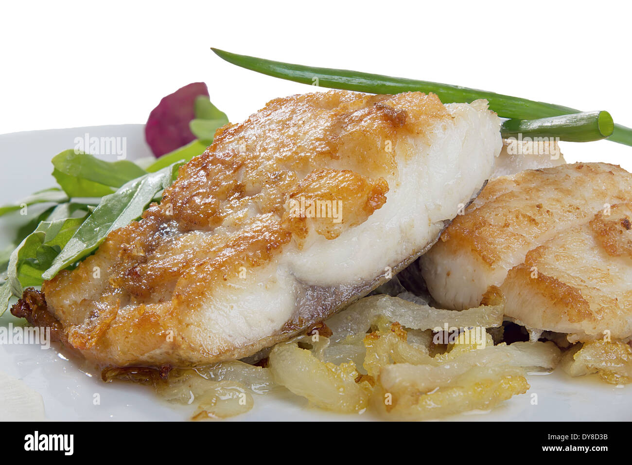 Fish dish - fried fish fillet with vegetables on white background Stock ...