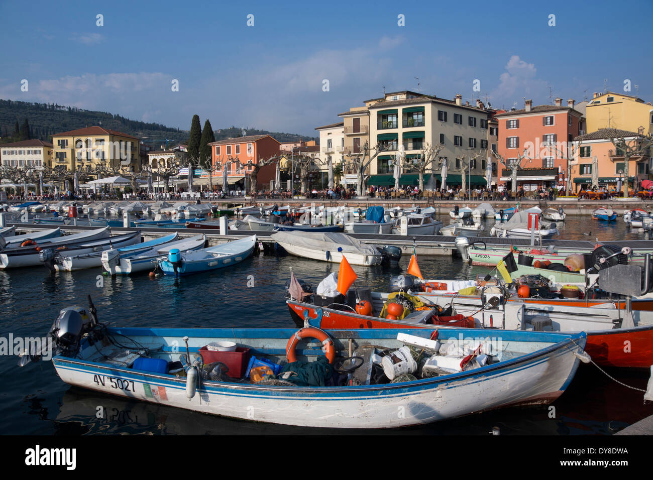 fishing boats in the harbour of garda village, lake garda, italy ...