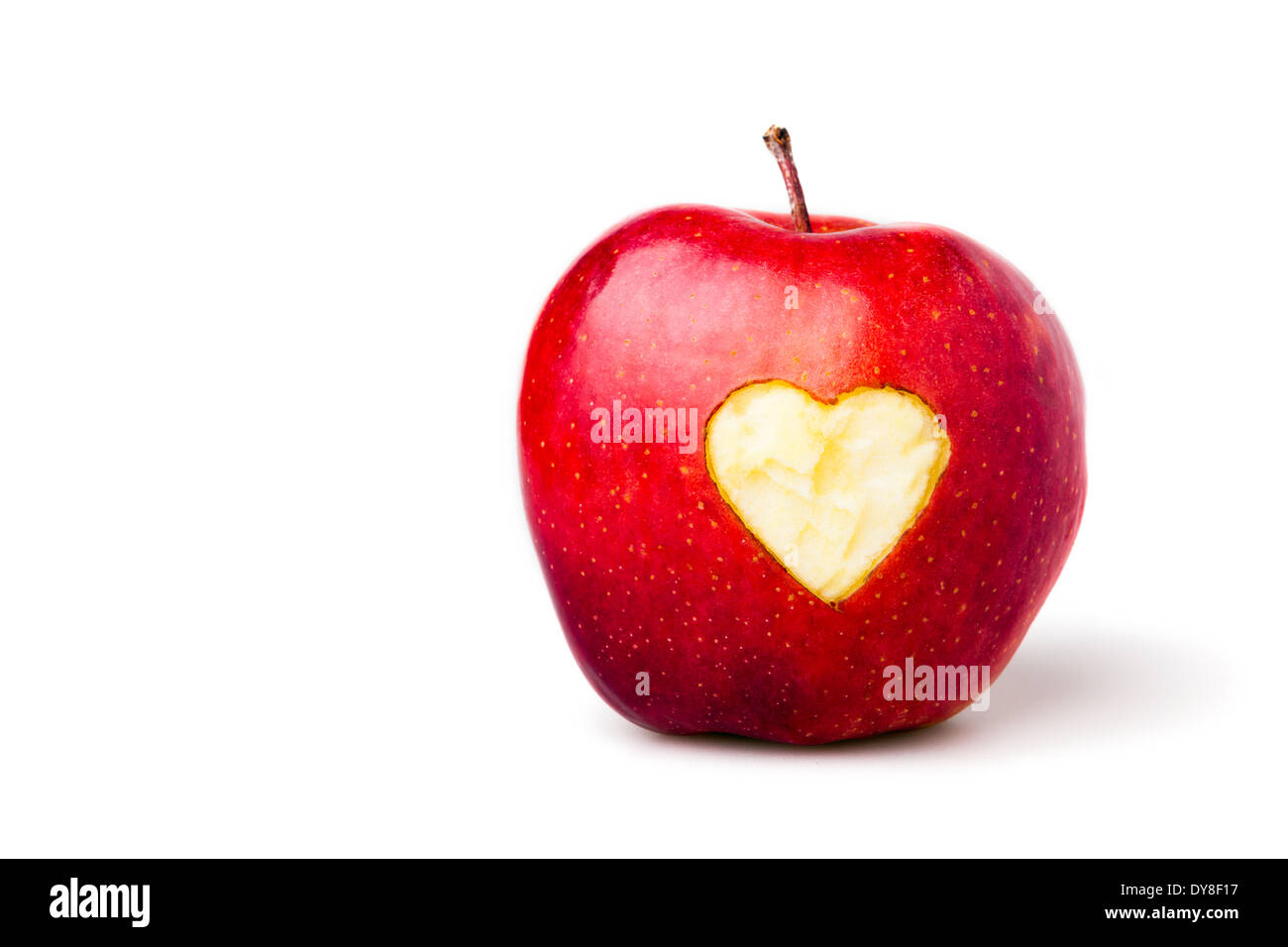 Red apple with a heart symbol against white background Stock Photo - Alamy