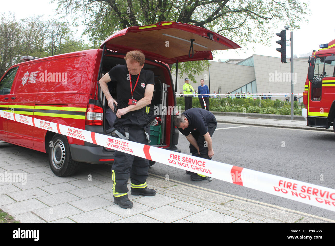 Fireman getting changed Stock Photo - Alamy