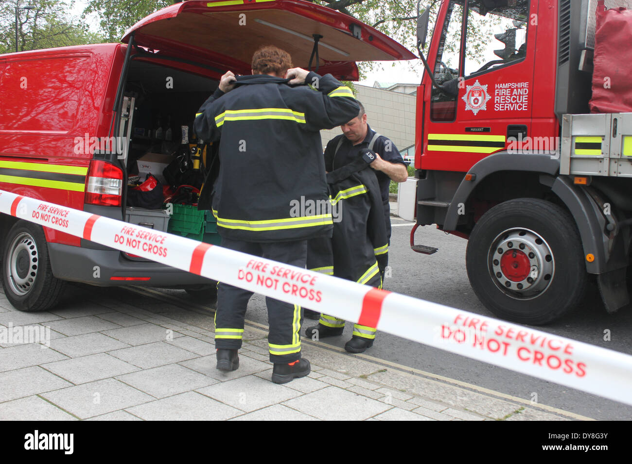 Fireman getting changed Stock Photo - Alamy