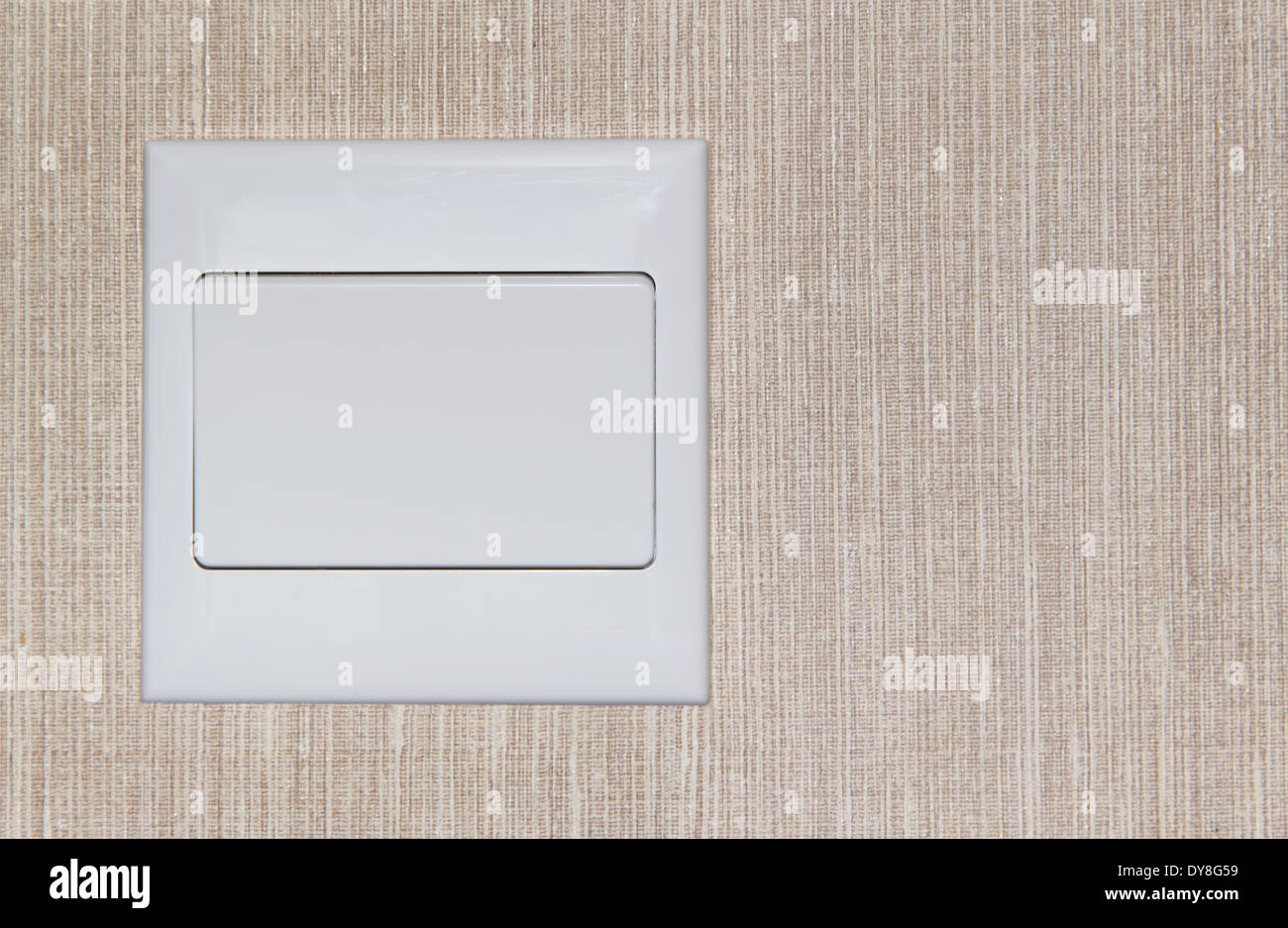 Single large light switch in beige color wall Stock Photo - Alamy