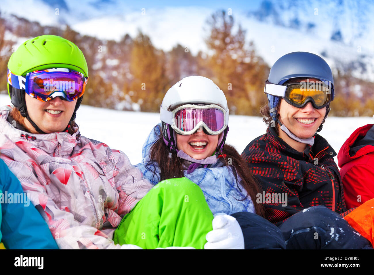 Happy group three friends wearing hi-res stock photography and images ...