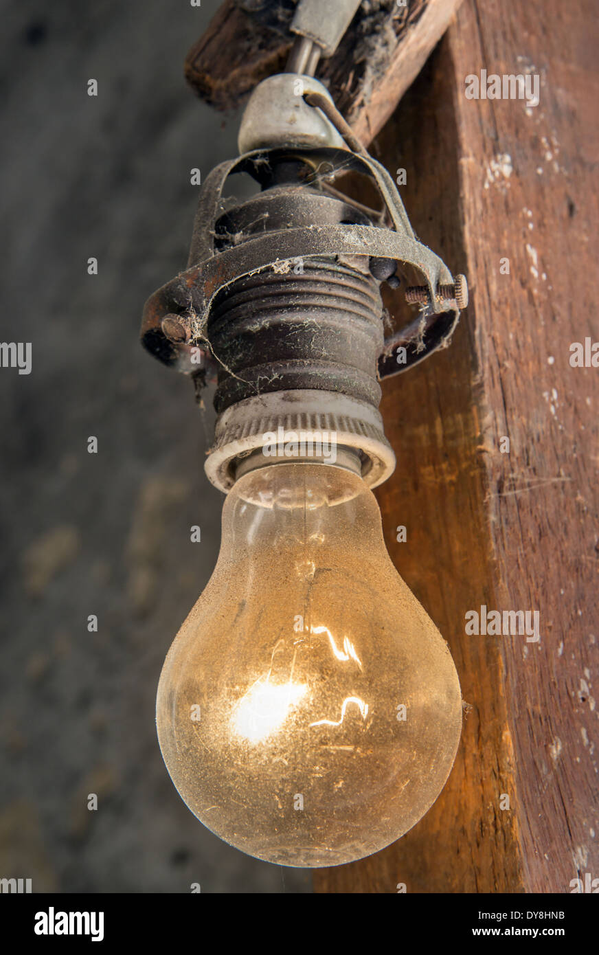 light bulb hanging on an electrical cable Stock Photo - Alamy