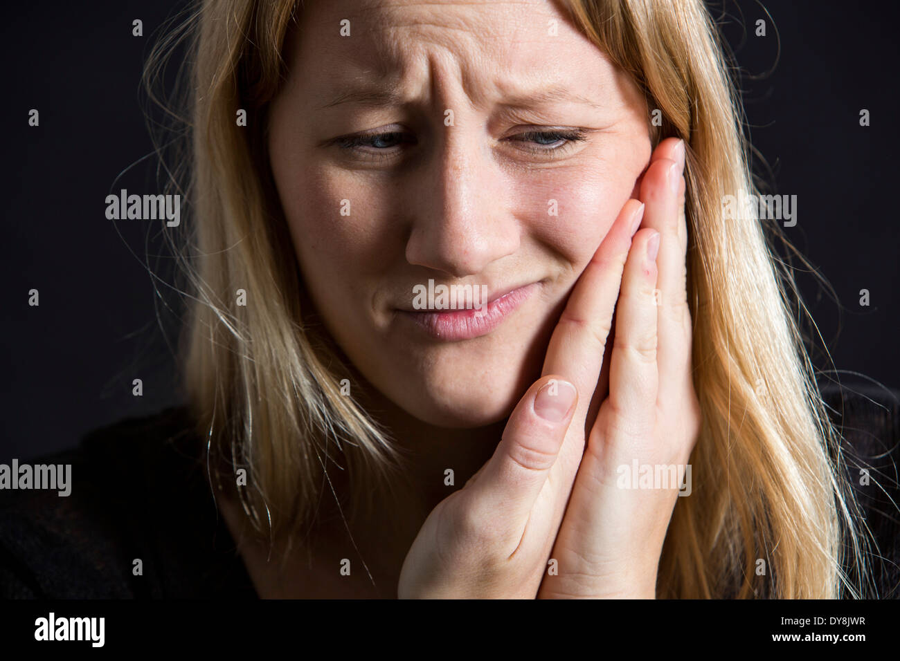 Young woman having toothache Stock Photo - Alamy