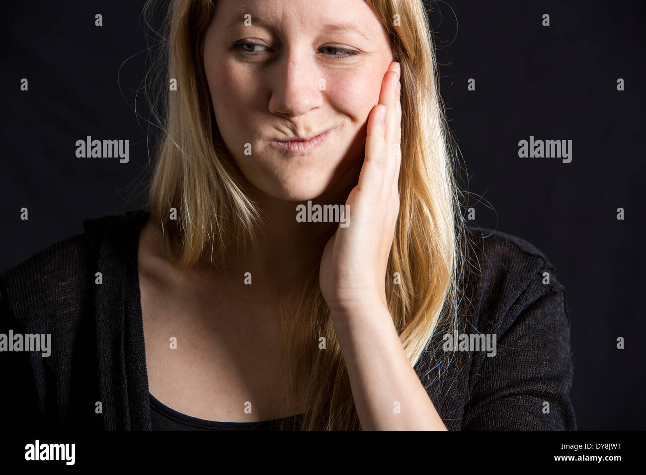 Young woman having toothache Stock Photo - Alamy