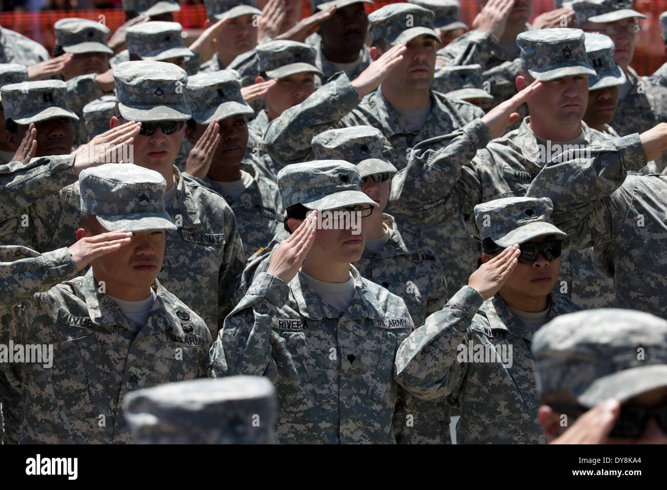 U.S. Army soldiers salute during memorial service for fellow soldiers ...