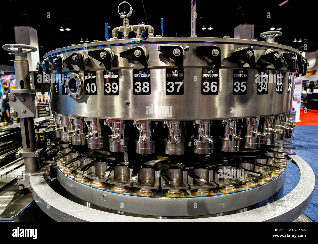 Denver, Colorado, USA. 09th Apr, 2014. A 40 valve can filler by Bevcorp ...