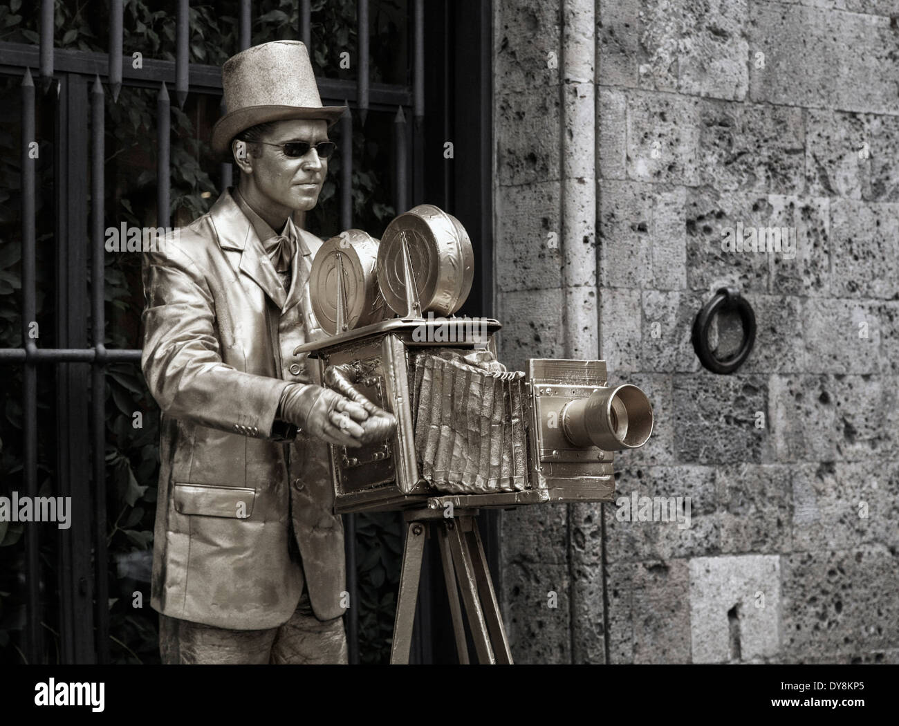 Old movie camera man street performer in Sienna Stock Photo - Alamy