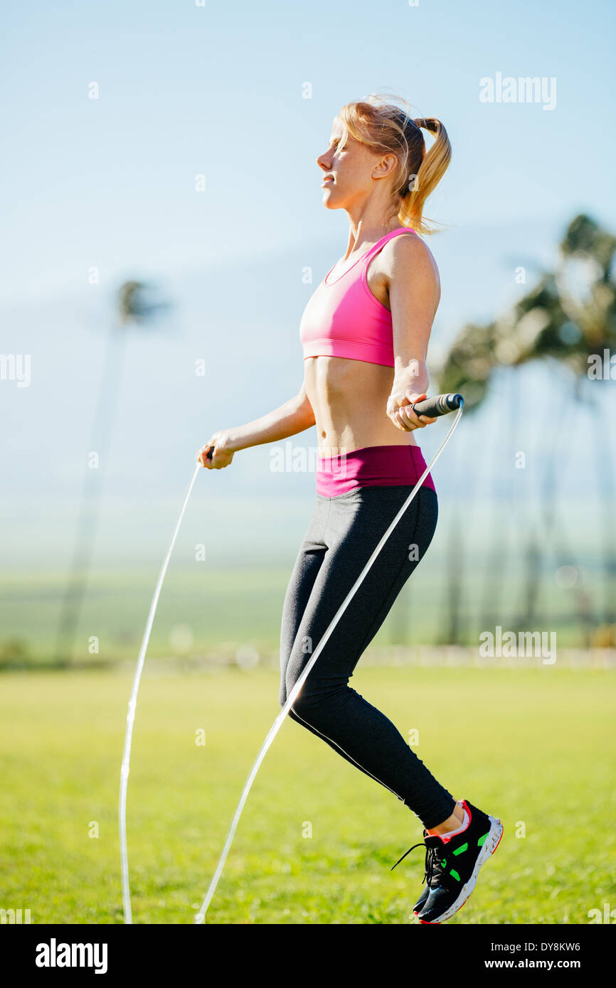 Female athlete exercising jump rope hi-res stock photography and images ...