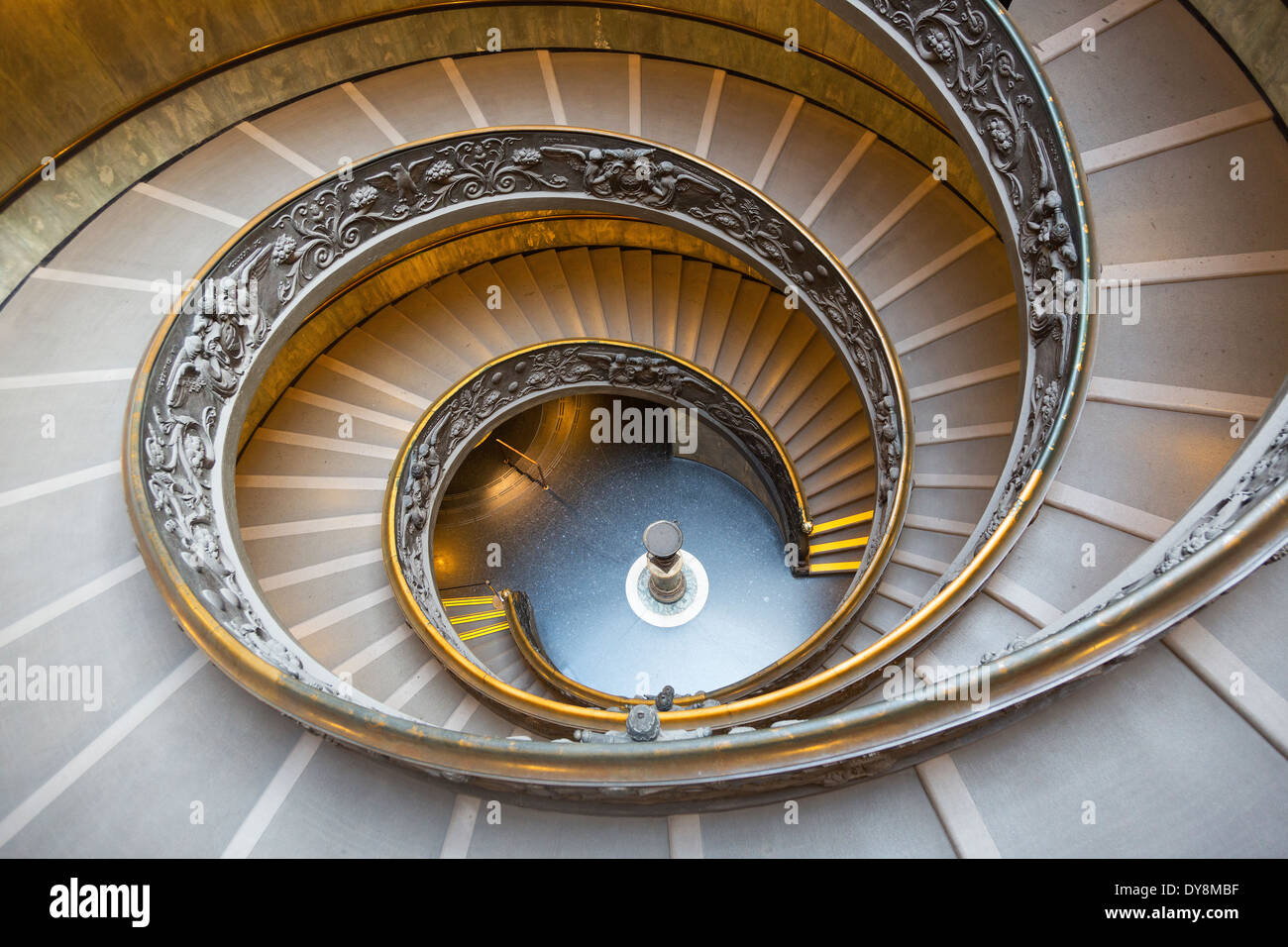 Golden railing on spiral staircase in Vatican museum Rome, Italy Stock ...