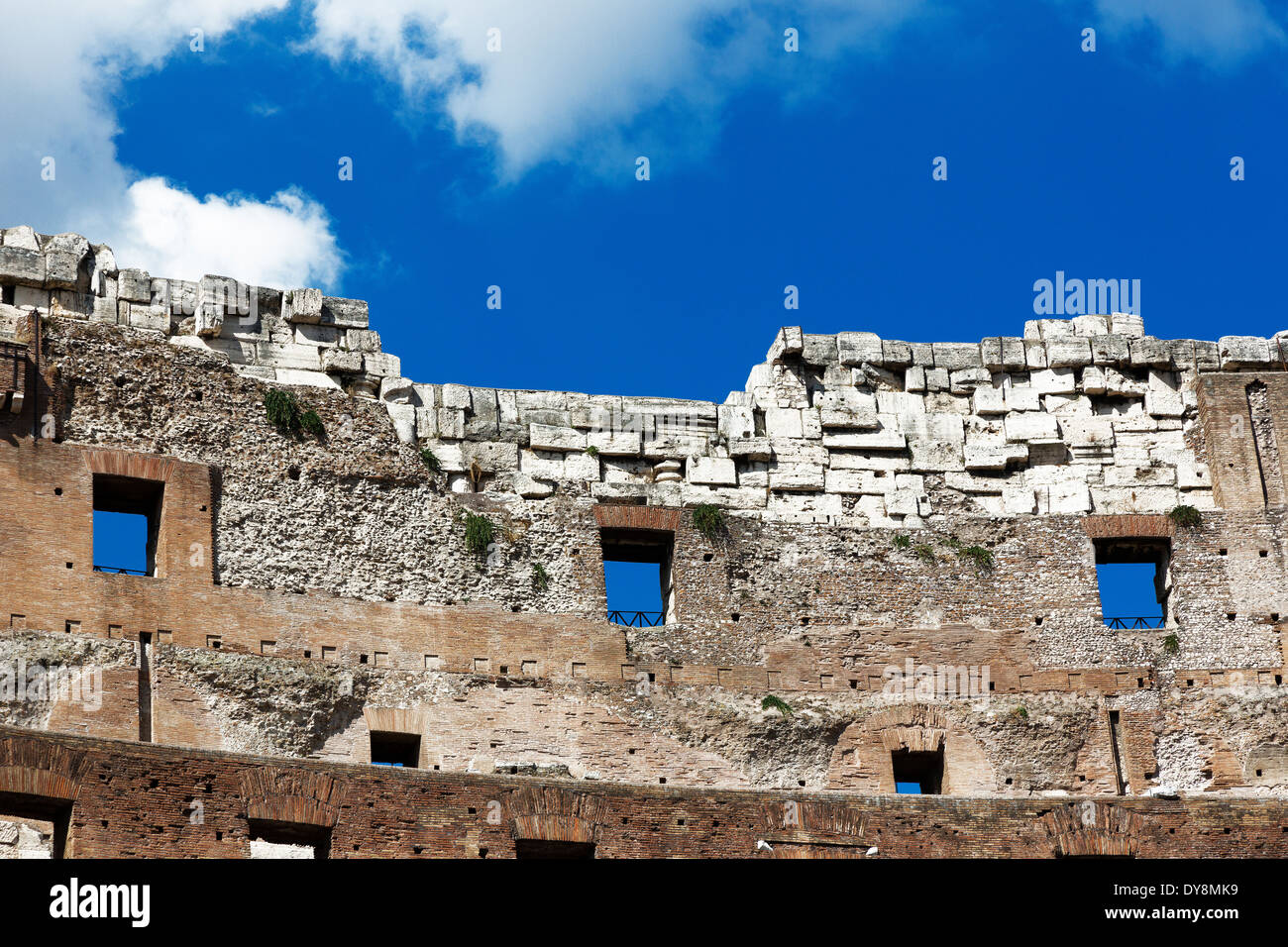 Stone blocks and brick work of interior of Roman Colosseum blue sky and ...