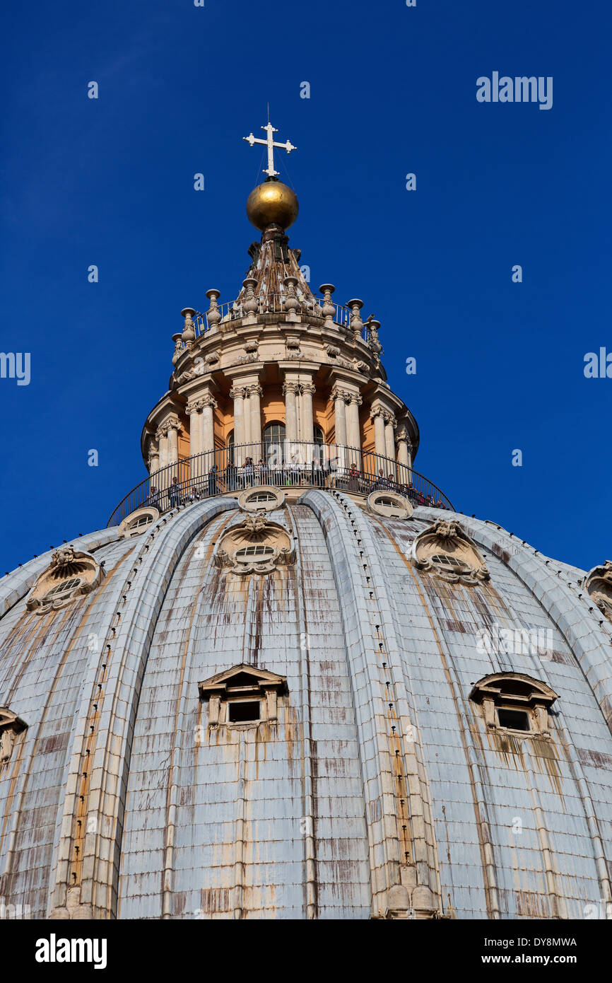 Glowing cross atop the dome of St. Peter's Basilica at the Vatican ...