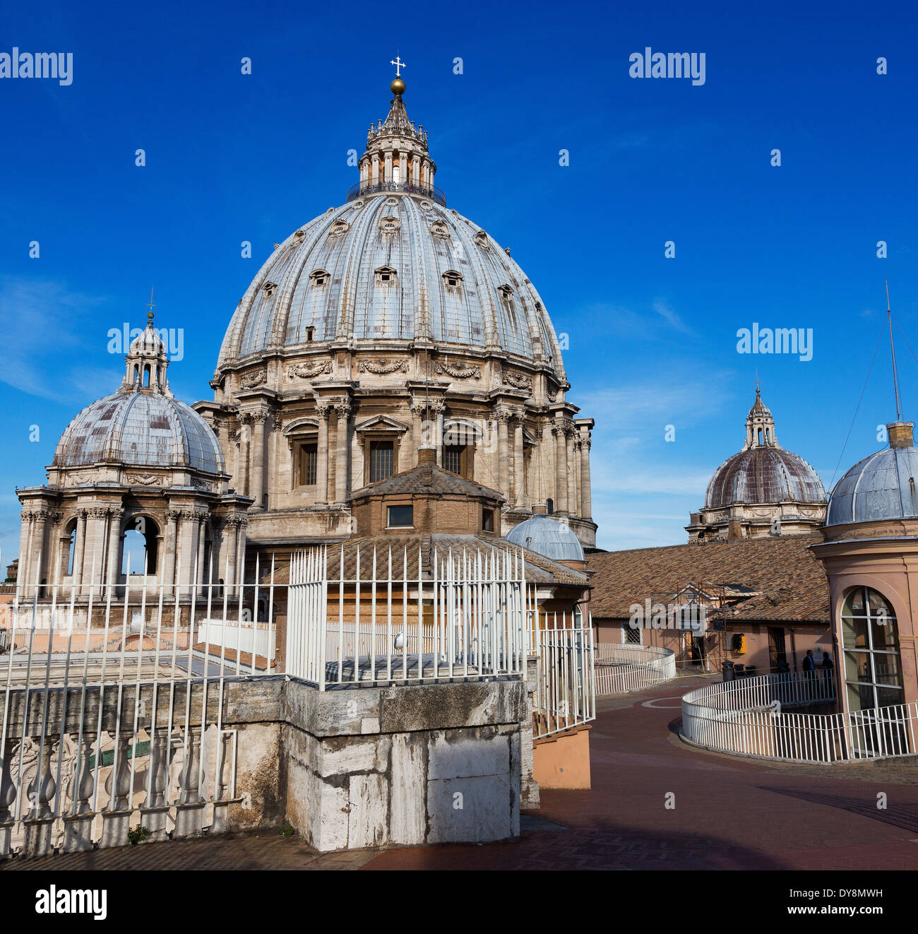 A top the roof of St. Peter's Basilica with dome in background with ...