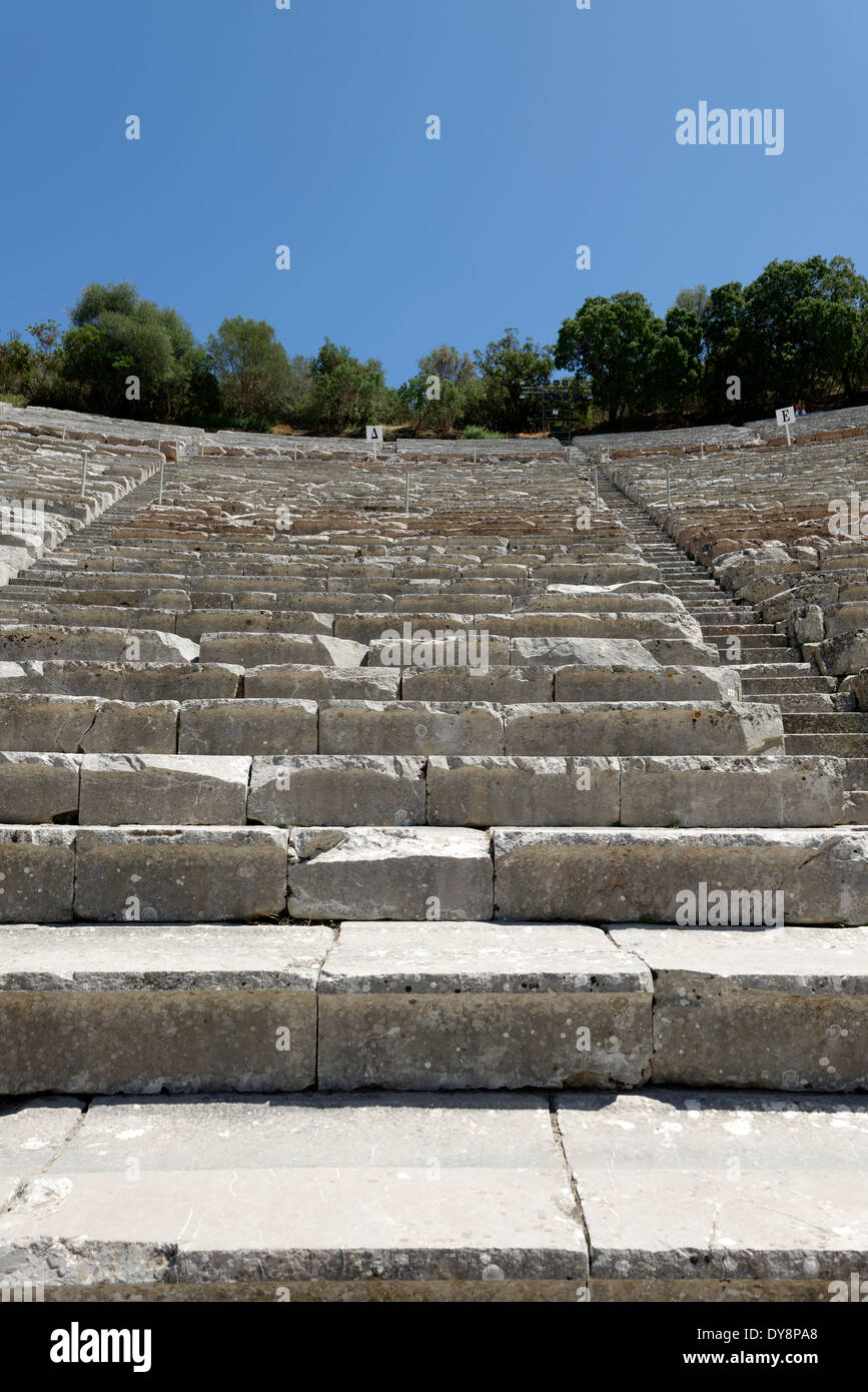Limestone seating ancient Greek theatre at sanctuary Asklepios ...