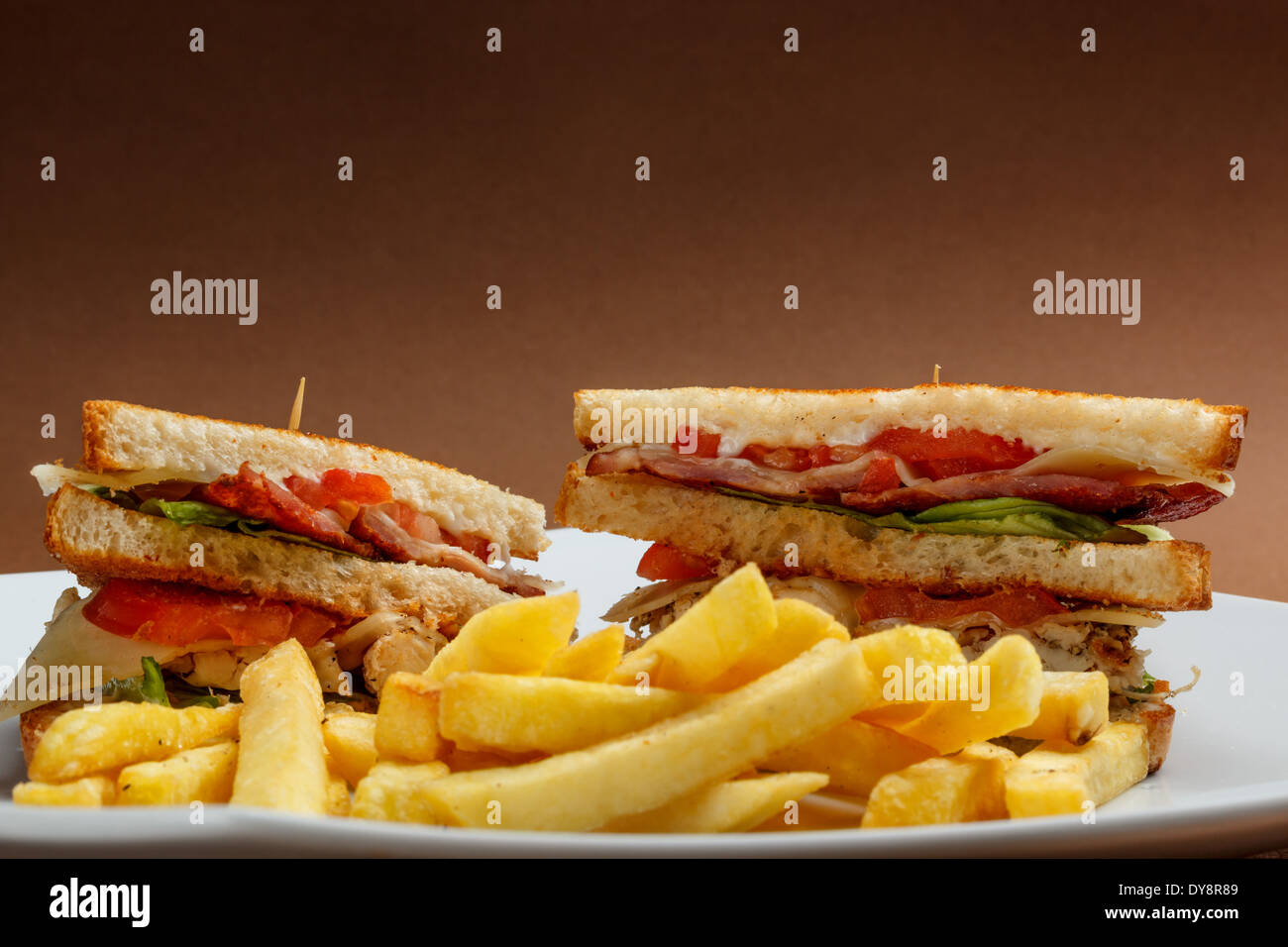Toasted sandwich served with french fries Stock Photo - Alamy